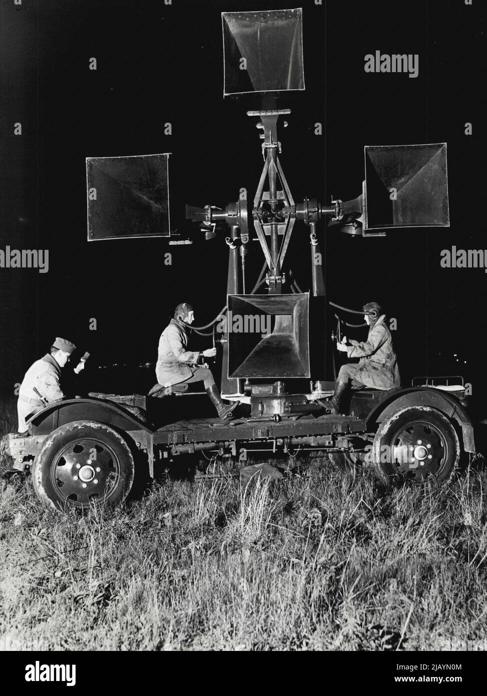 Night War Maneuvers At Mitchel Field - Crew of soldiers working on an ...