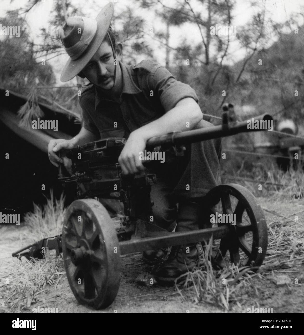 Private Des Ellis, of Kalgoorlie, examines a Russian-made Guryanov ...