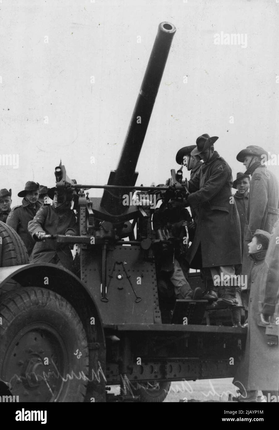 Menacing Barrel of an anti-air-craft gun points to the sky as the gun ...