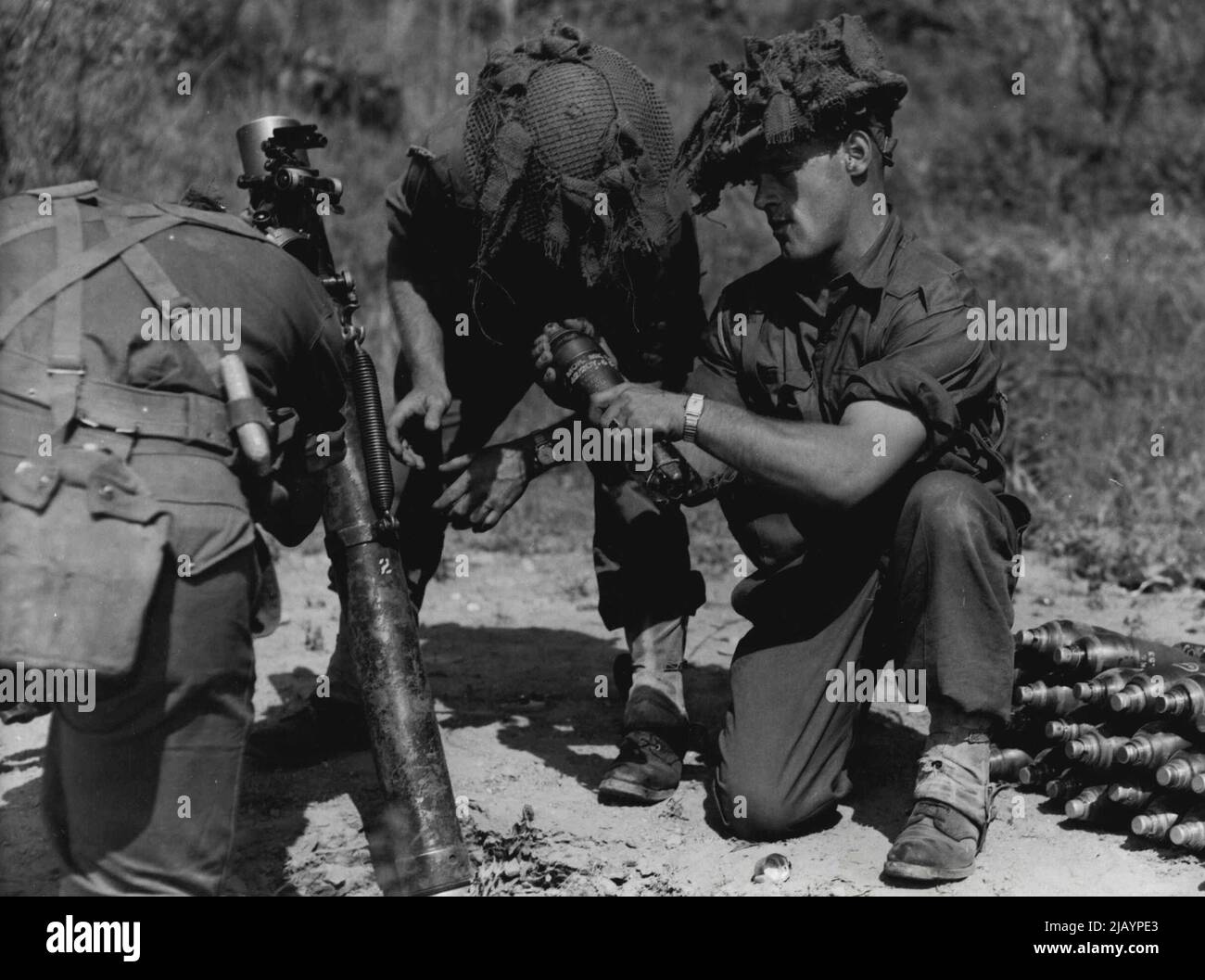 A mortar team of the First Battalion Royal Australian Regiment goes ...