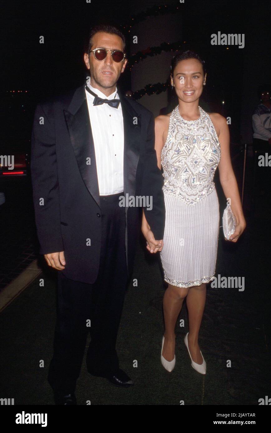 Tia Carrere with Elie Samaha at the Fire And Ice Event December 02 ...
