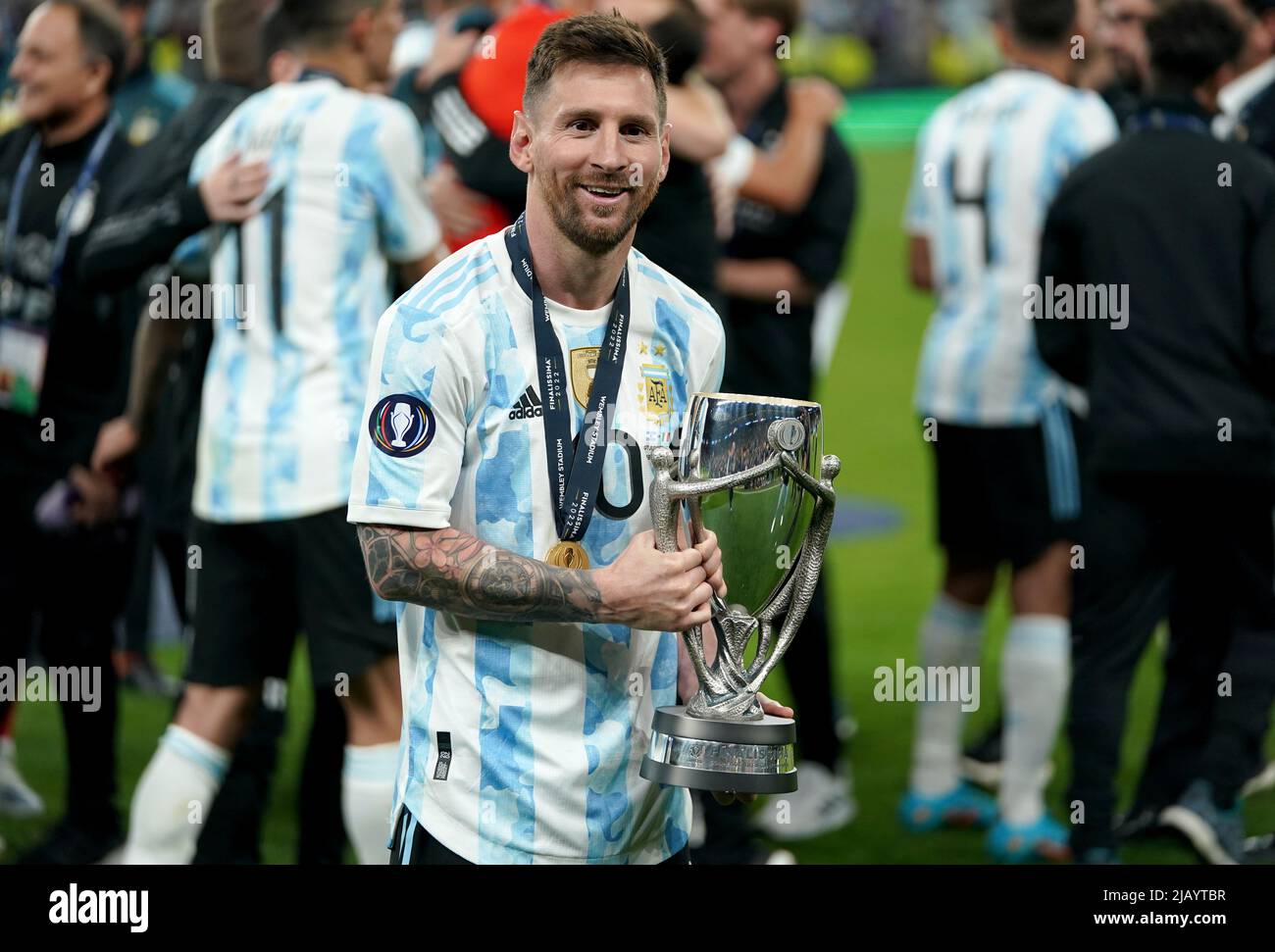 Argentina’s Lionel Messi with the Finalissima 2022 trophy after the ...