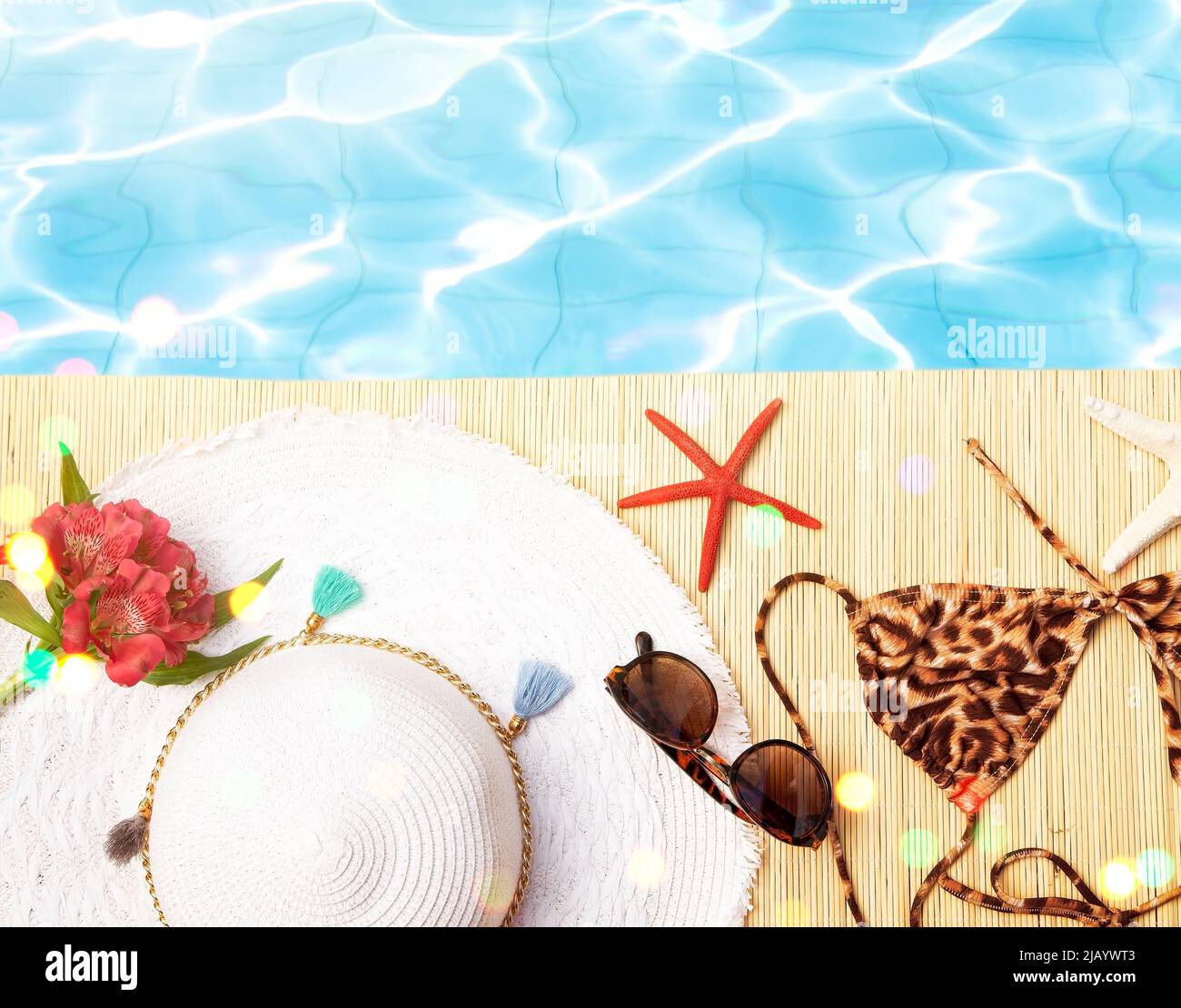 Summer accessories by the pool Stock Photo - Alamy