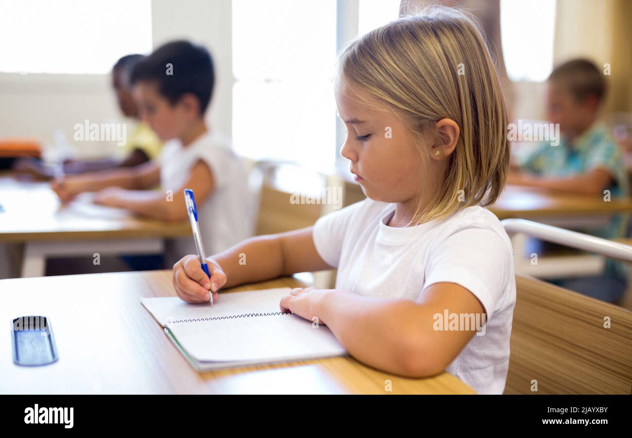 Young kids interacting classroom hi-res stock photography and images ...