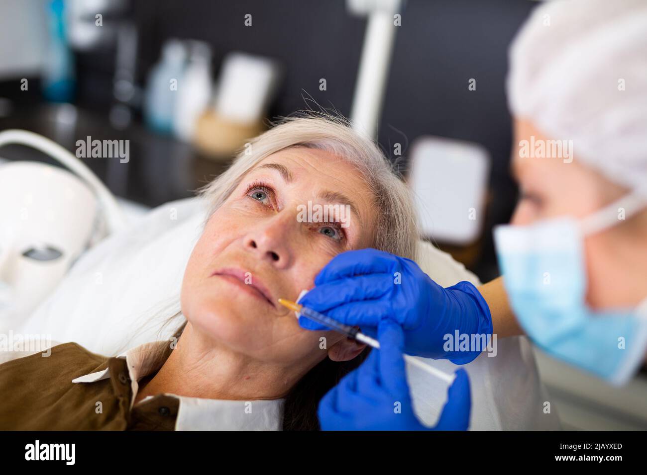 Nurse injections elderly woman hi-res stock photography and images - Alamy