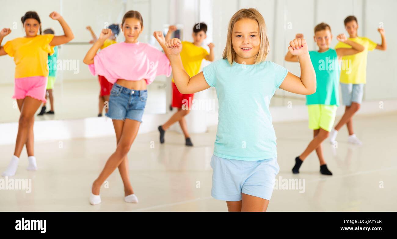 Children exercising dance moves together Stock Photo - Alamy