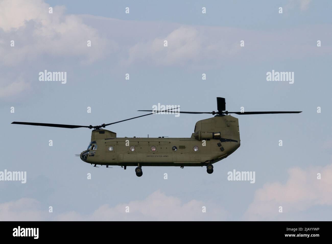 A Boeing CH 47 Chinook helicopter with the United Army flying at Yokota ...