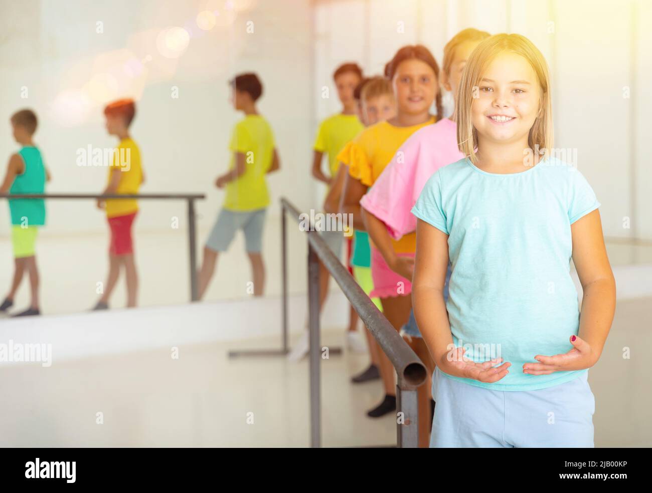 Children exercising ballet moves in studio Stock Photo - Alamy