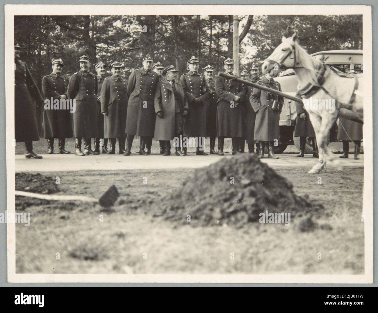 Officers against the background of the forest (kick digging ceremony) a ...