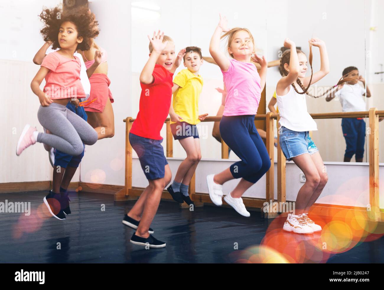 Boys and girls jump hi-res stock photography and images - Alamy