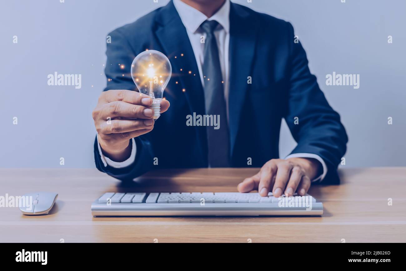 Businessman with light bulbs. At office. Ideas for ideas, innovation ...