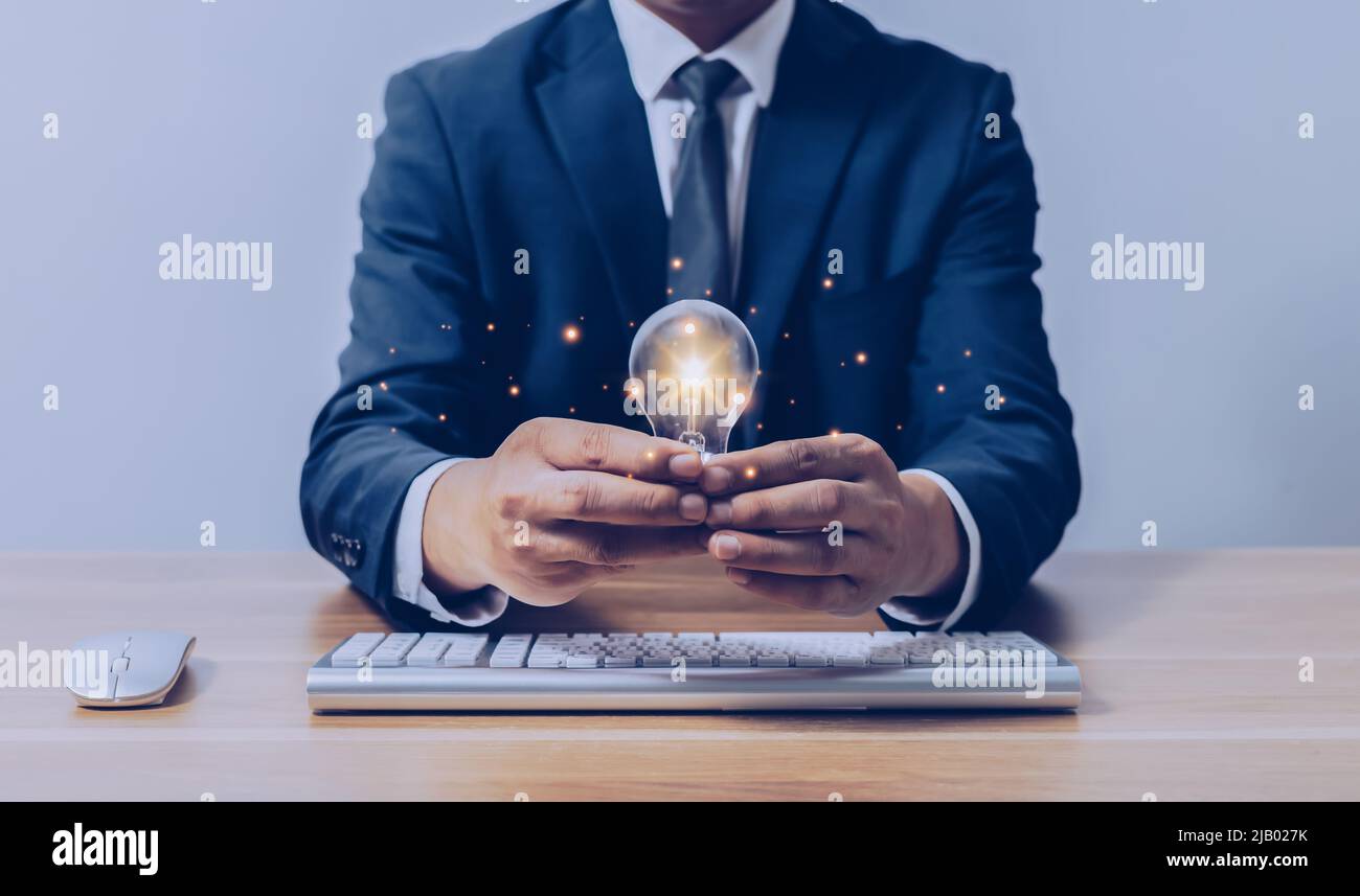 Businessman with light bulbs. At office. Ideas for ideas, innovation ...