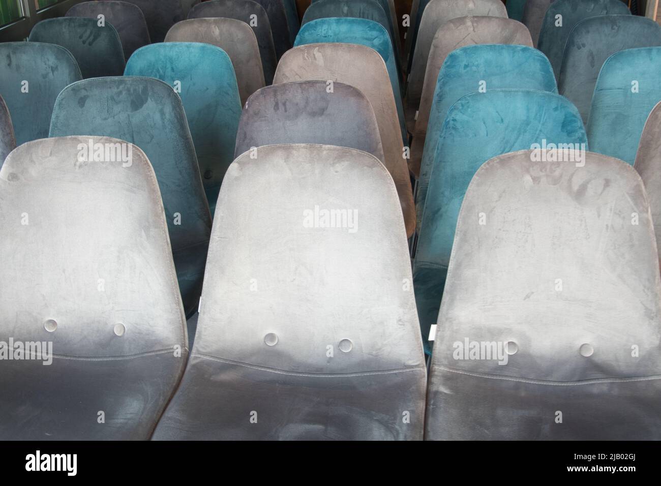 Blue empty seats prepared for confences, presentations and other events ...