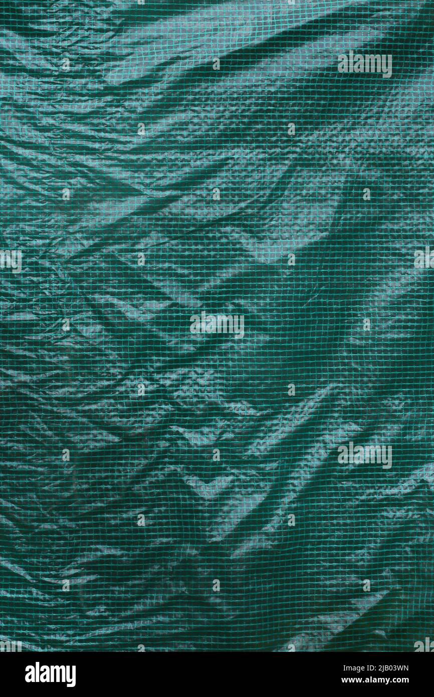 Green grid plastic foil film. Greenhous plastic cover. Texture ...