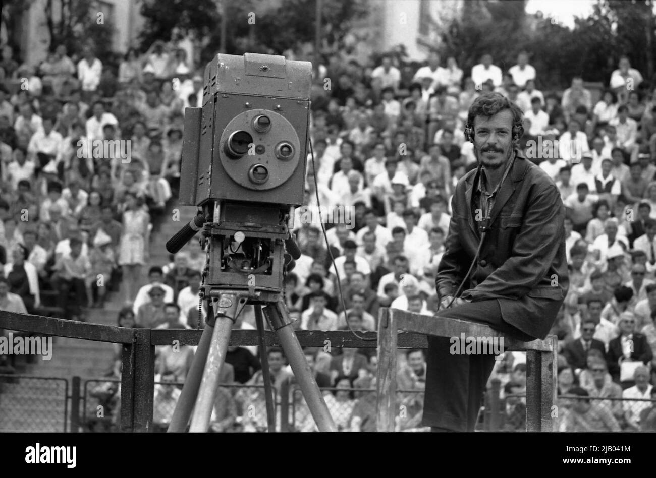 Cameraman at a sport event in Romania in the 1970s Stock Photo - Alamy