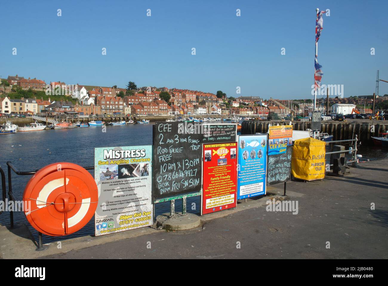 Adverts for trips, Waterfront of Whitby, North Yorkshire, England, UK ...