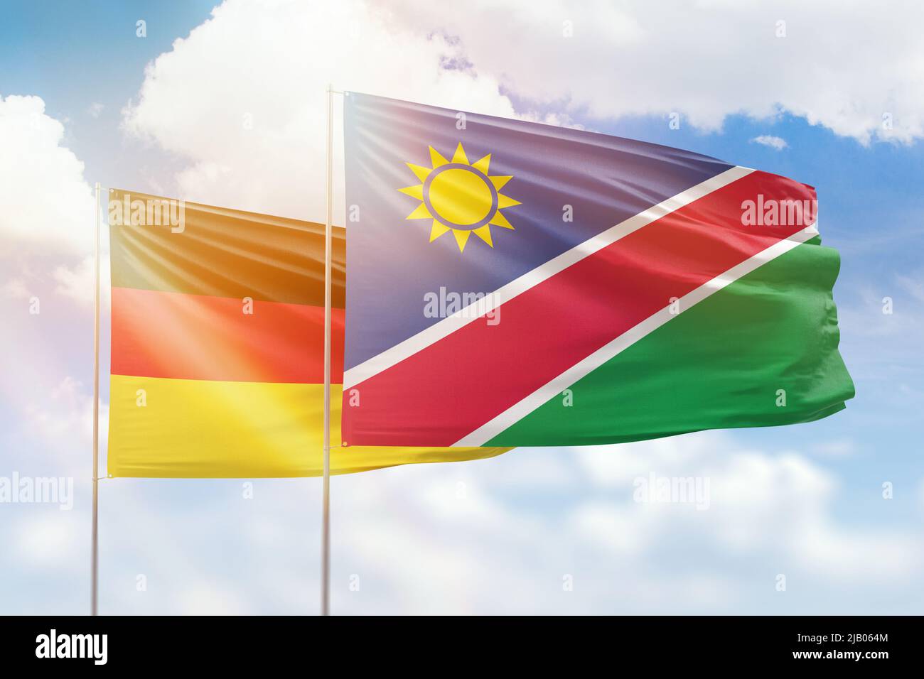 Sunny blue sky and flags of namibia and germany Stock Photo - Alamy