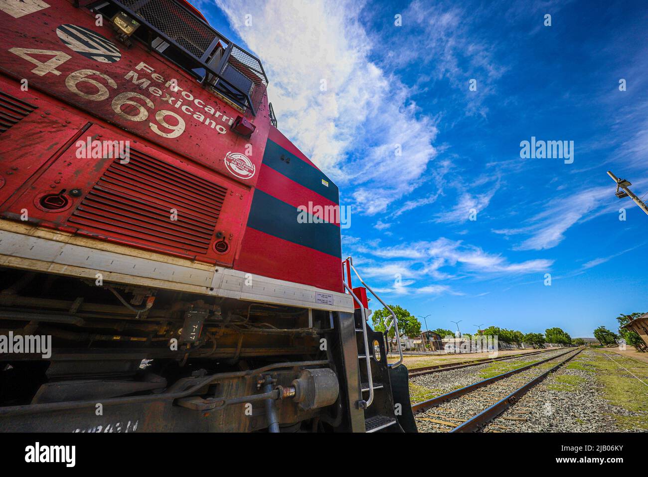 Train on the tracks in the town of Esqueda, Mexico. Pueblo Esqueda in ...