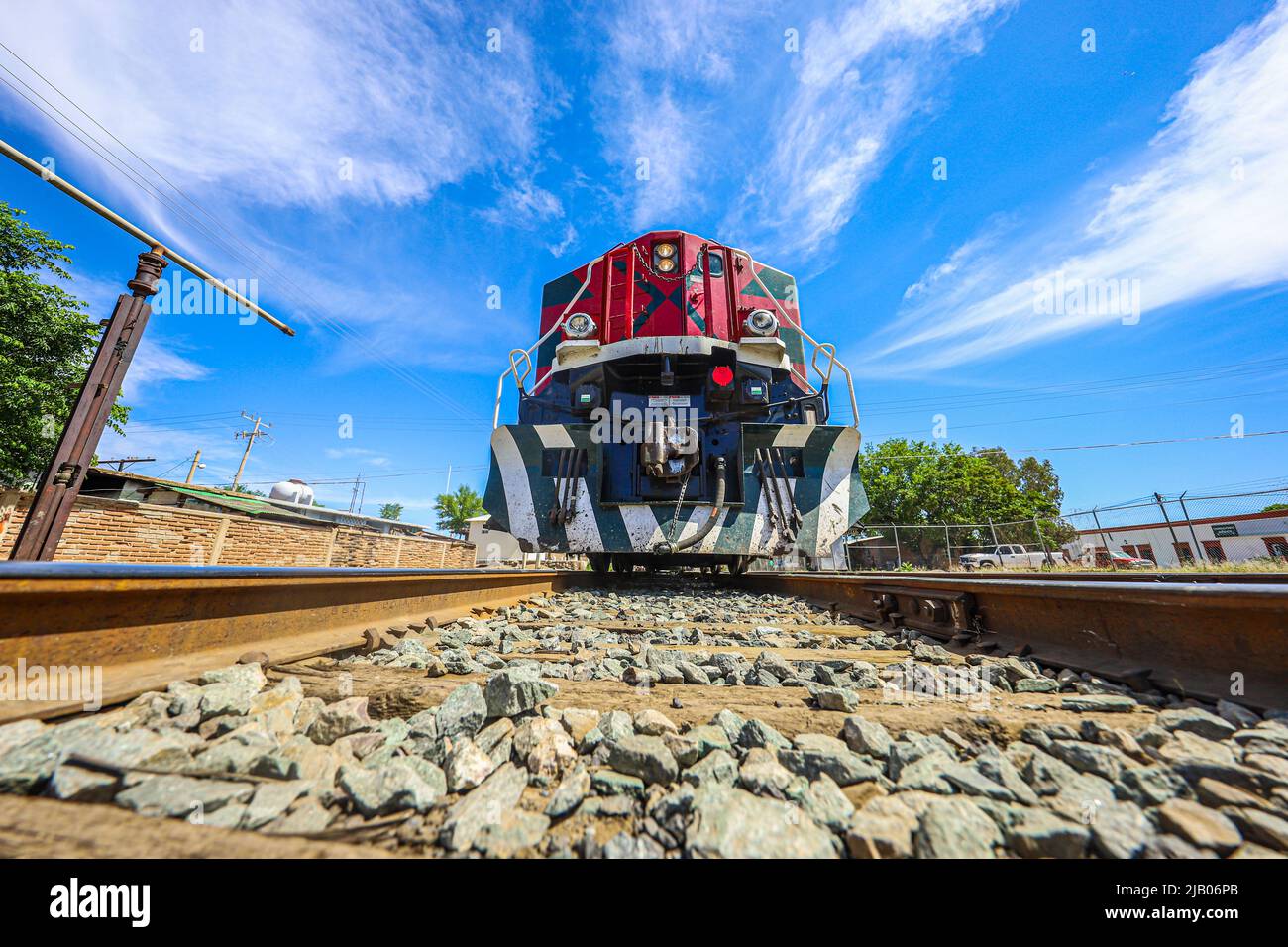 Train on the tracks in the town of Esqueda, Mexico. Pueblo Esqueda in ...