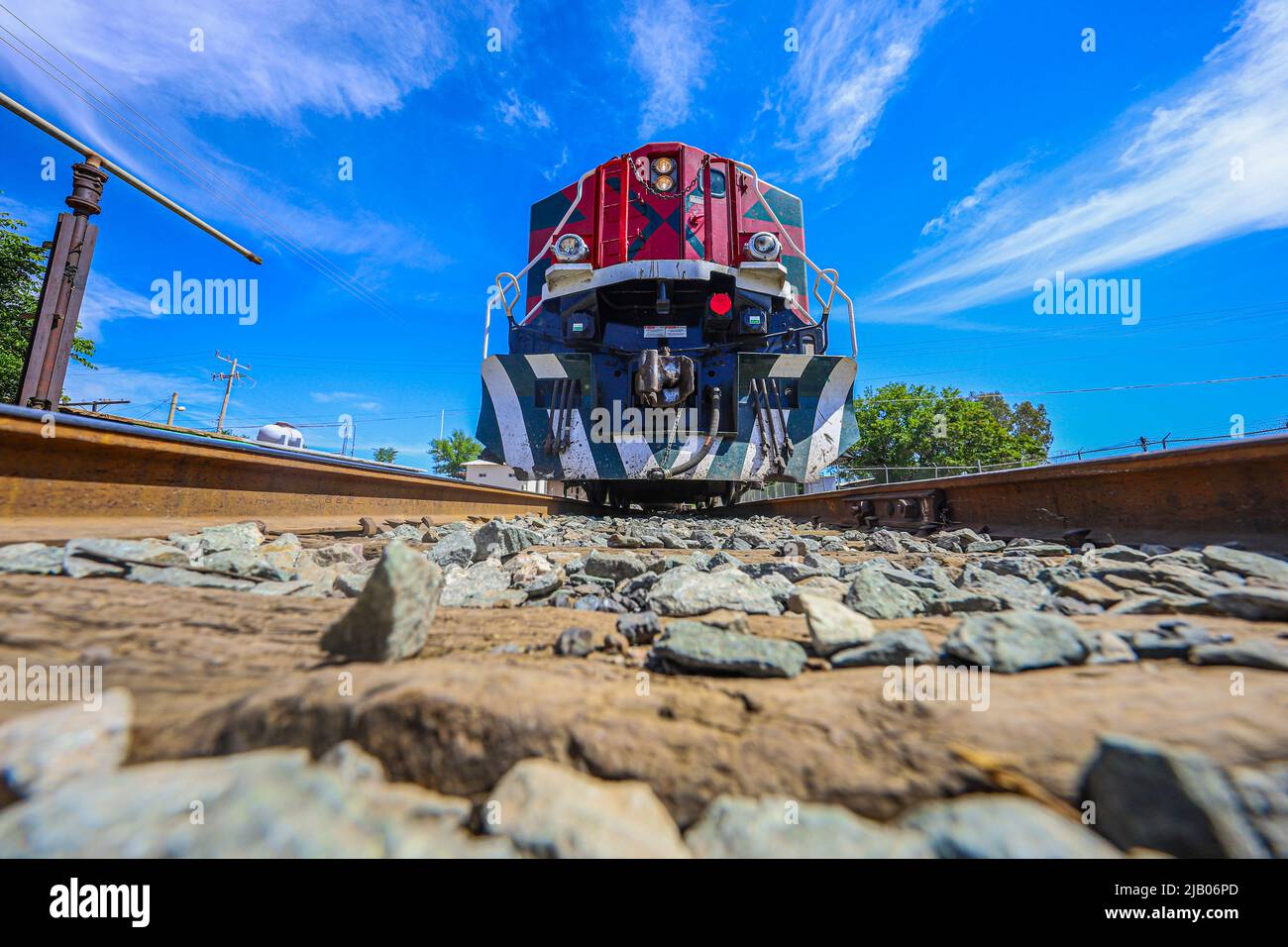 Train on the tracks in the town of Esqueda, Mexico. Pueblo Esqueda in ...