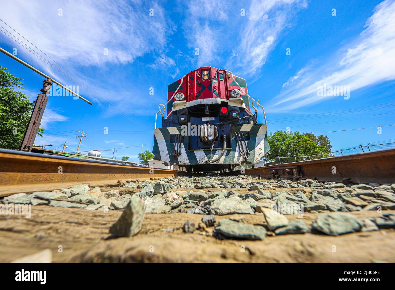 Train on the tracks in the town of Esqueda, Mexico. Pueblo Esqueda in ...