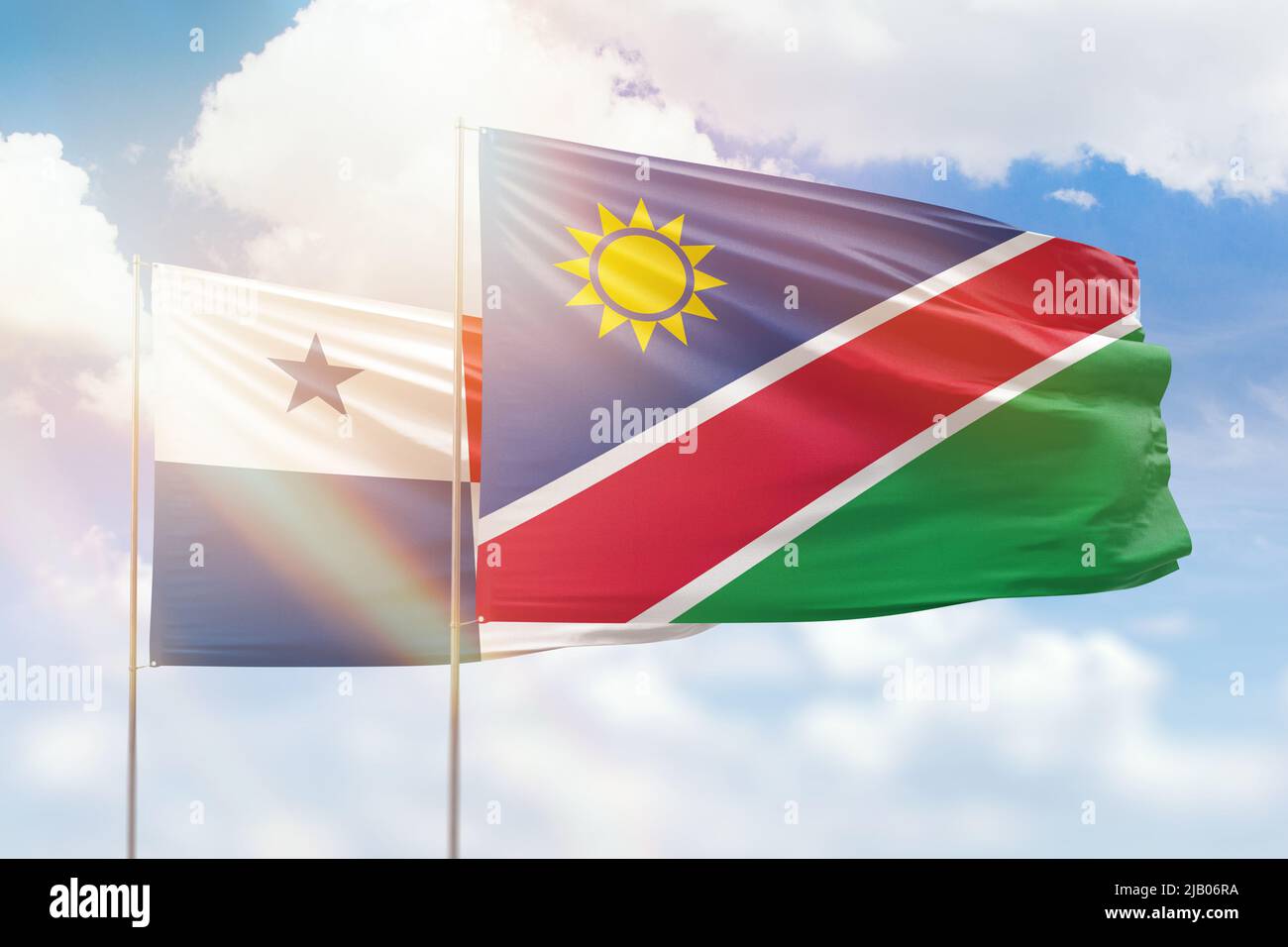 Sunny blue sky and flags of namibia and panama Stock Photo - Alamy