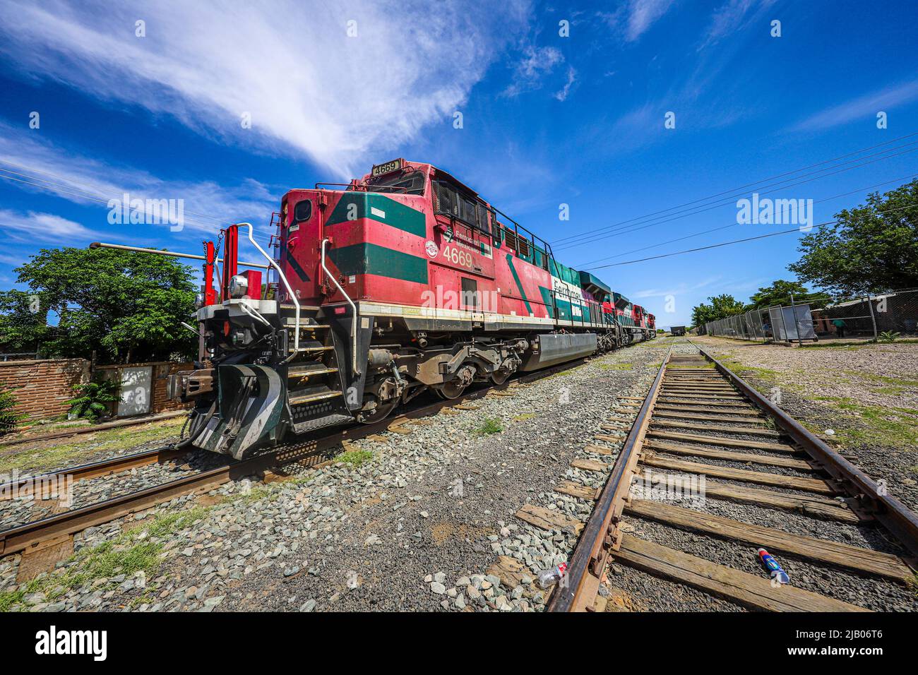 Train on the tracks in the town of Esqueda, Mexico. Pueblo Esqueda in ...