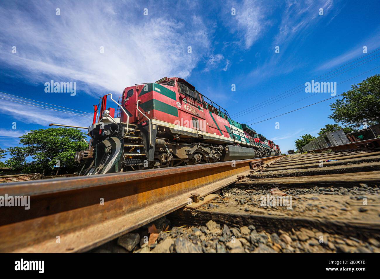 Train on the tracks in the town of Esqueda, Mexico. Pueblo Esqueda in ...