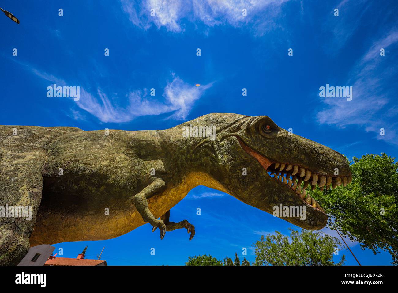 A Tyrannosaurus rex dinosaur sculpture in Esqueda, Mexico. Pueblo ...