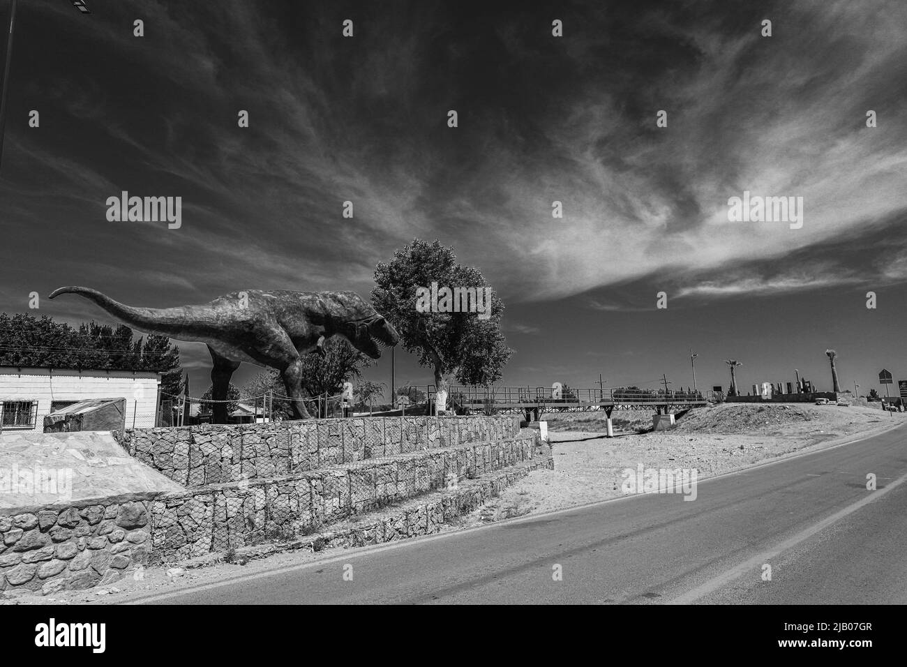 A Tyrannosaurus rex dinosaur sculpture in Esqueda, Mexico. Pueblo ...