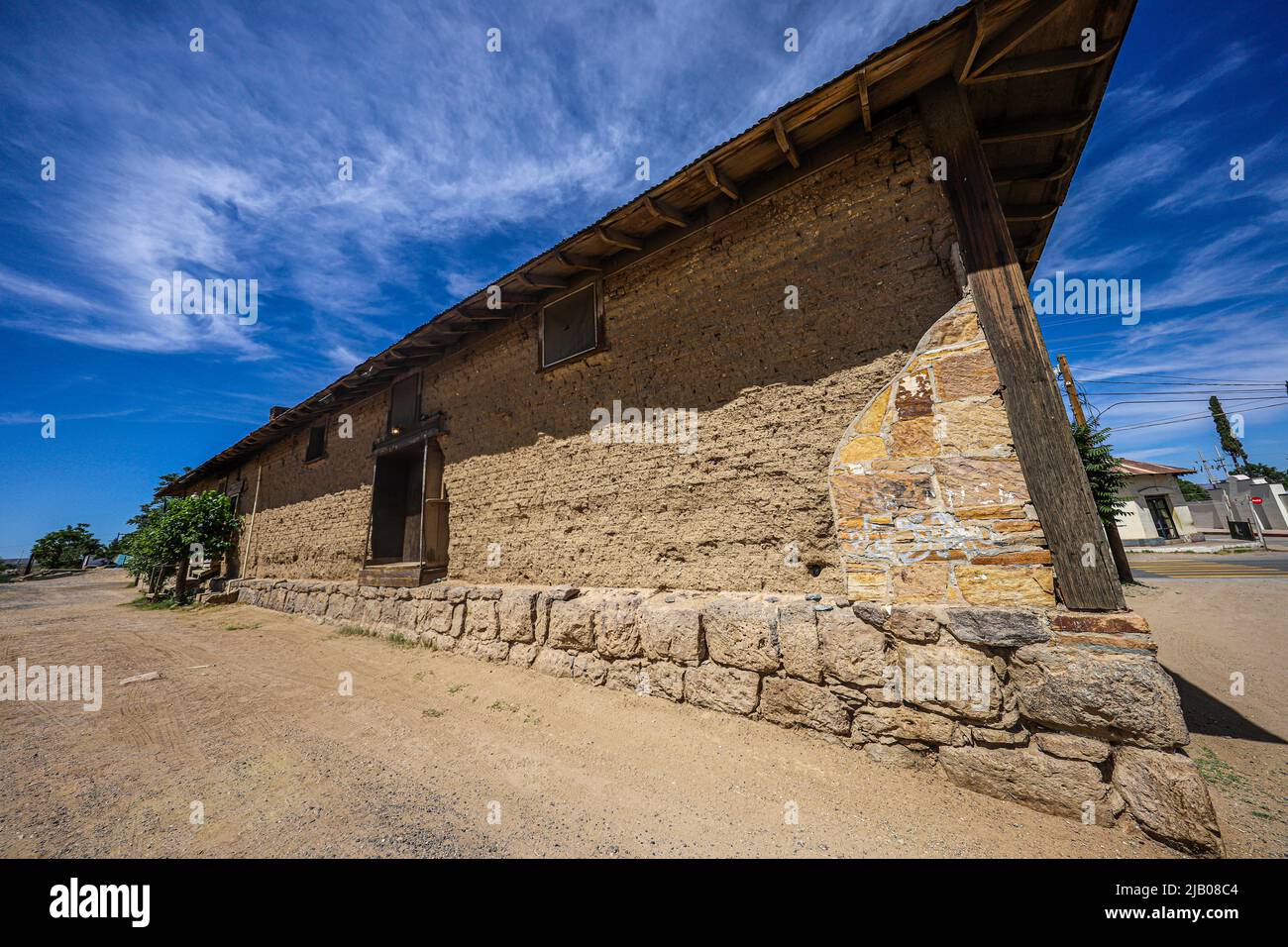 Train tracks, railway and old adobe train station in Esqueda, Mexico ...