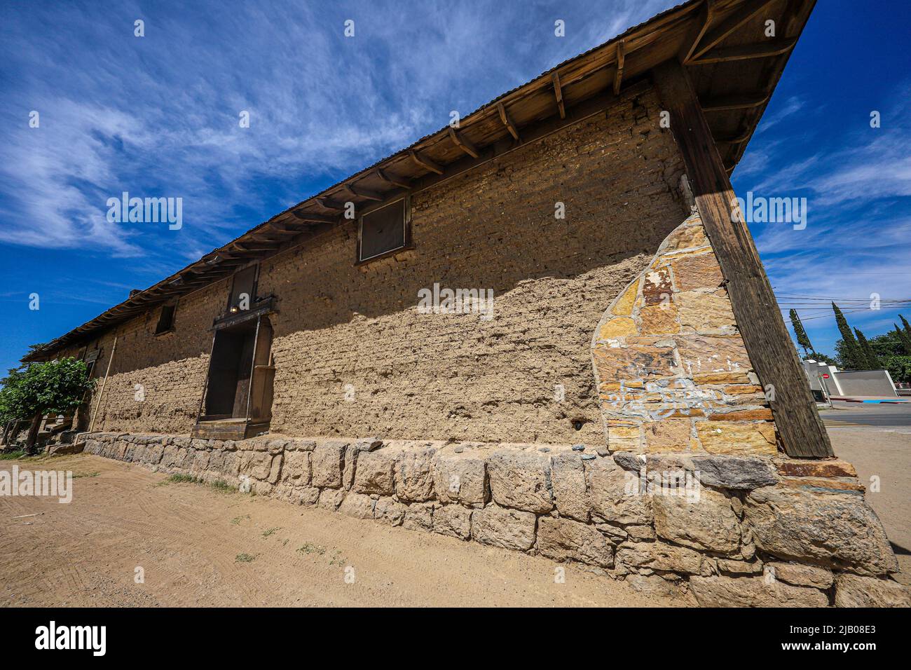 Train tracks, railway and old adobe train station in Esqueda, Mexico ...