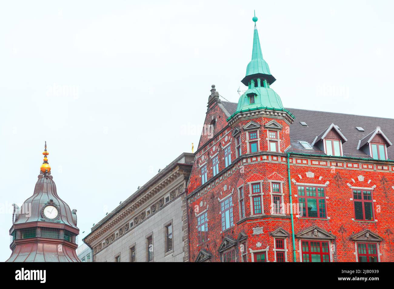 Danish architecture with spire . Red bricks building in Scandinavia ...