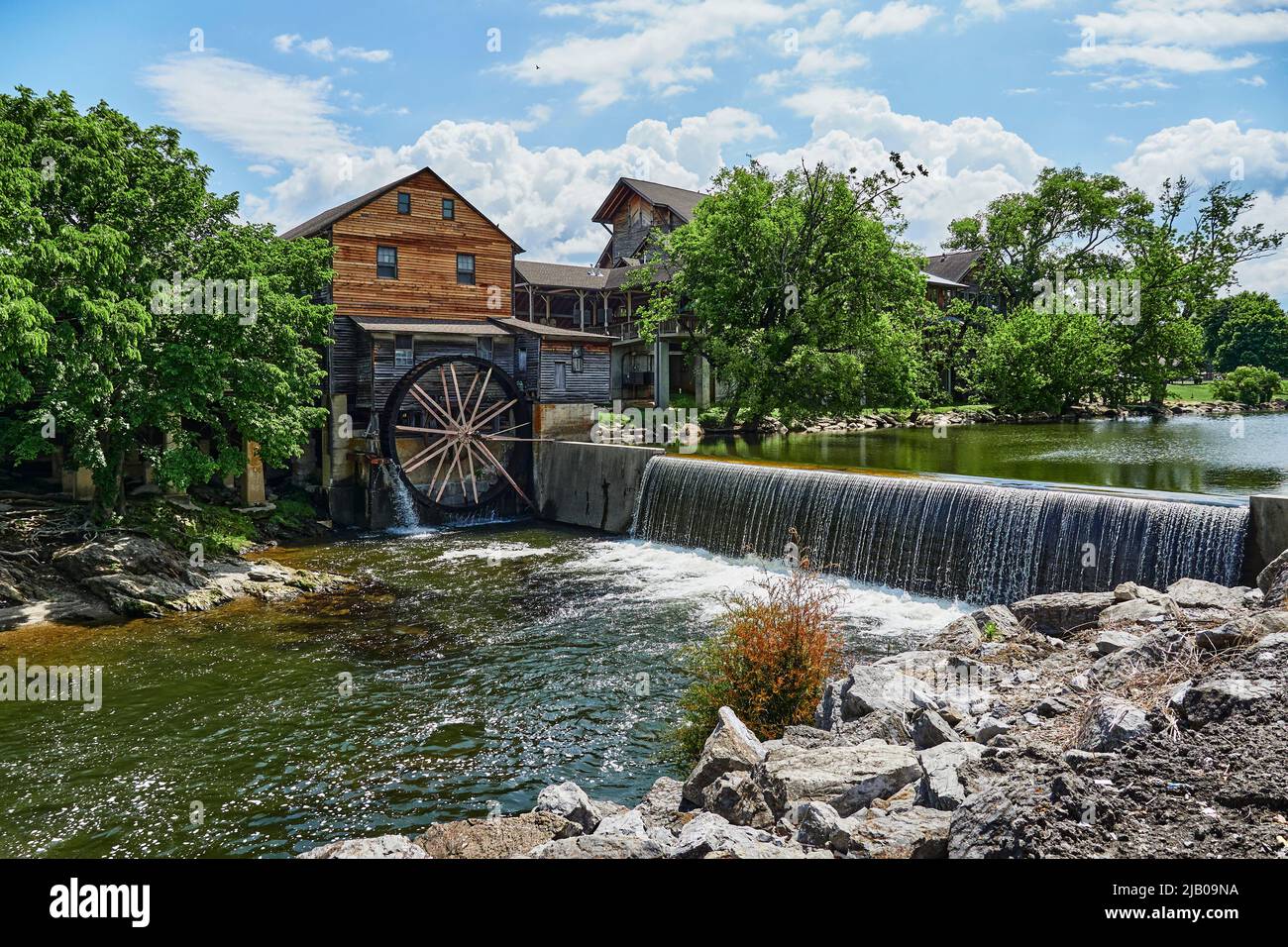Old historic rustic grist mill on the West Prong Little Pigeon River, Pigeon Forge Tennessee ...
