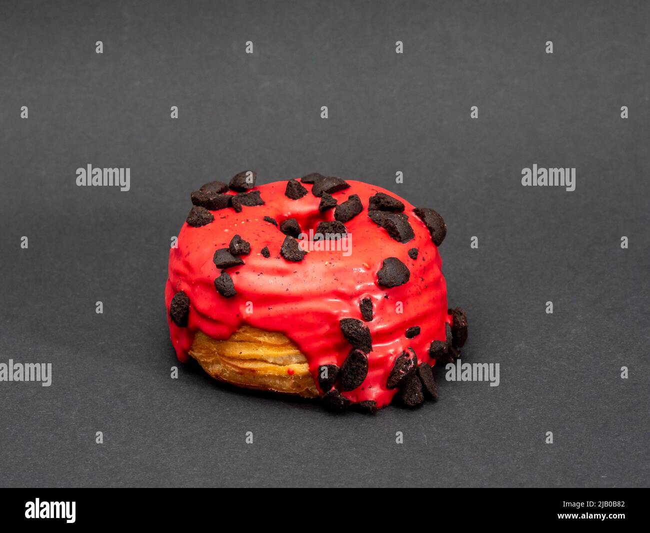 Red and blue cronuts on a black background. High quality photo Stock ...