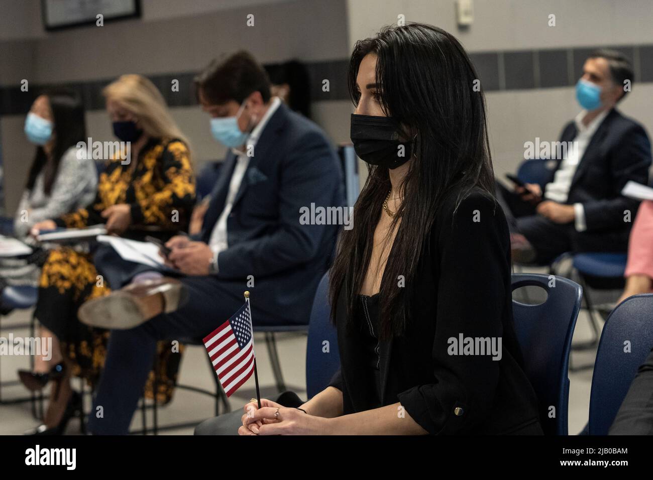 New York, NY - June 1, 2022: A woman holds an American flag during ...