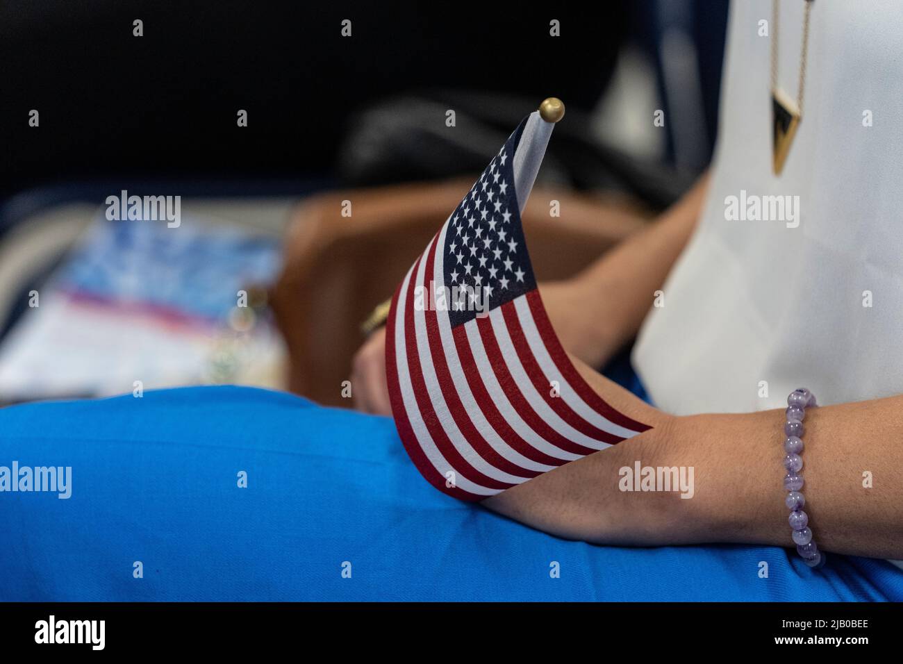 New York, NY - June 1, 2022: A woman holds an American flag during ...