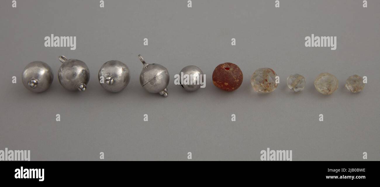 Five tumors and five beads Stock Photo - Alamy