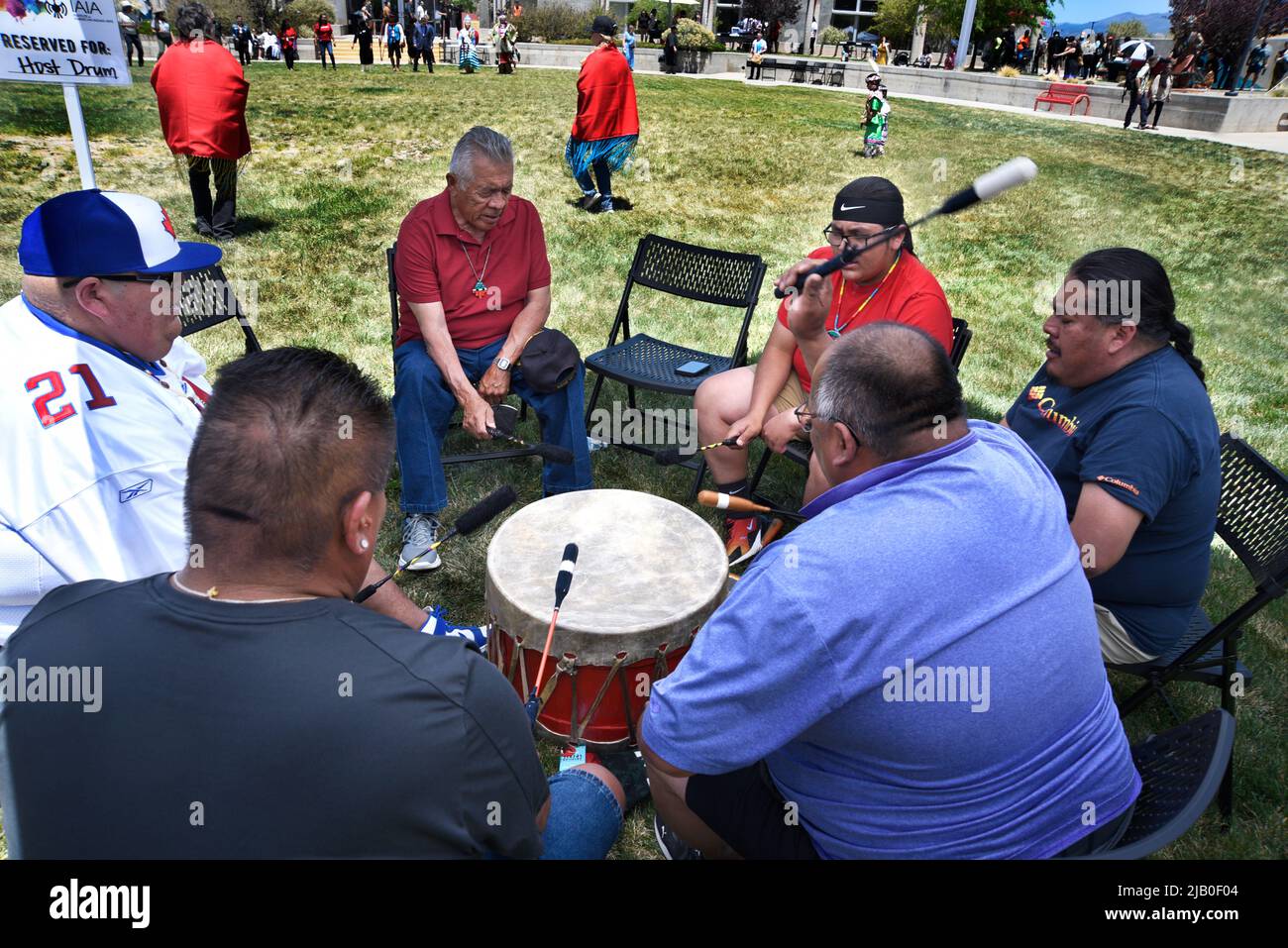A Native American drum team perform at a graduation pow wow at the ...