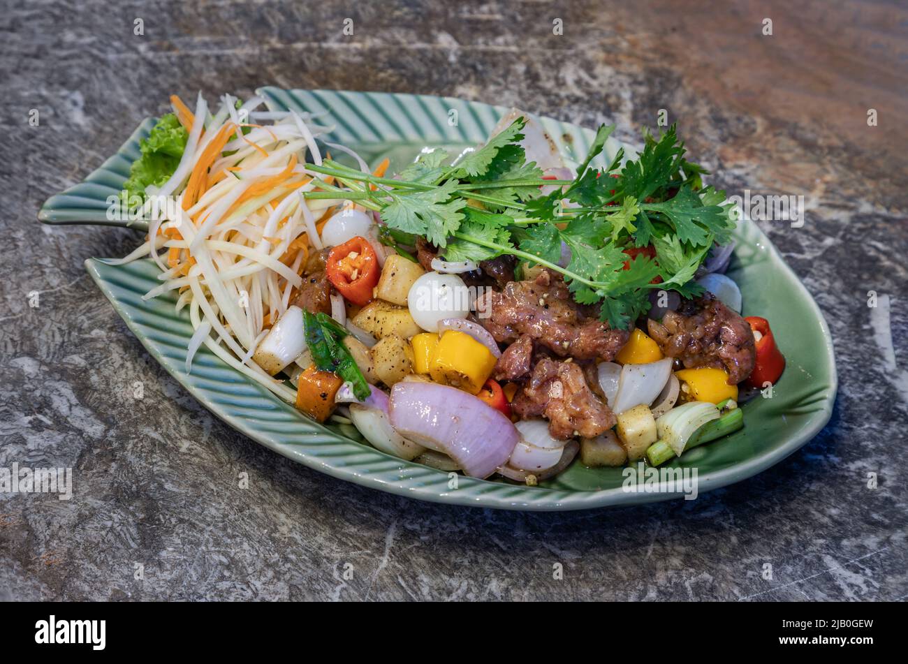 stir fry sweet sour Deep fried pork ribs and Pickled garlic served with ...