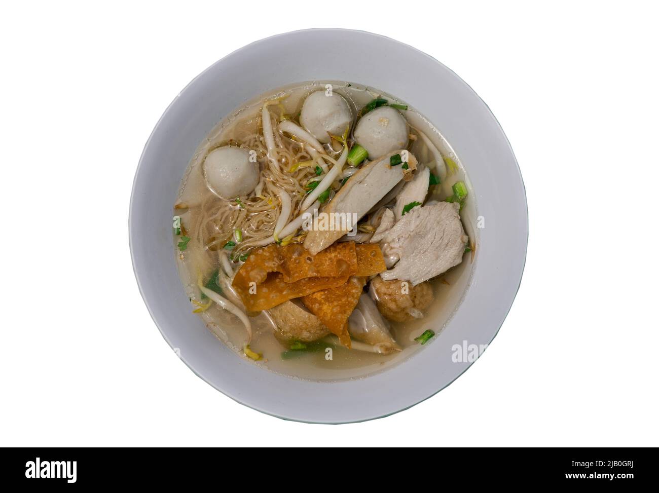 Traditional egg noodles soup with fish ball, shrimp meatball, pork ...