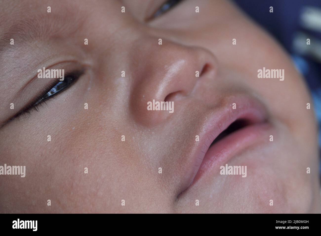 baby face sad crying close-up Stock Photo - Alamy