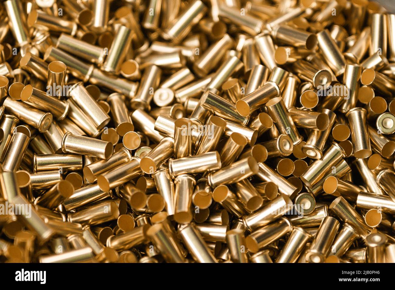 Pile of golden shells of bullets as background close view Stock Photo ...