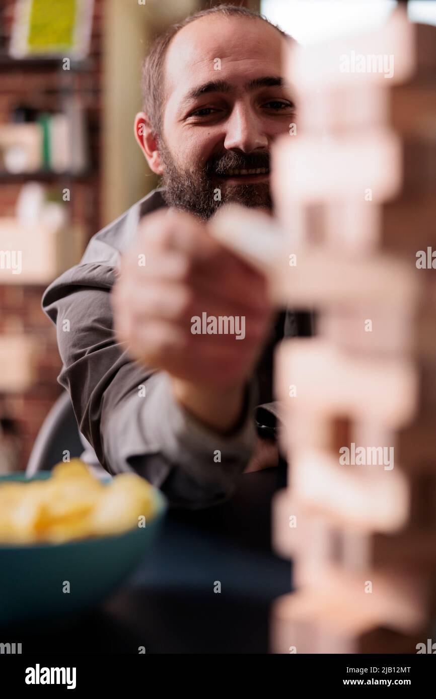 Men in wooden blocks hi-res stock photography and images - Alamy