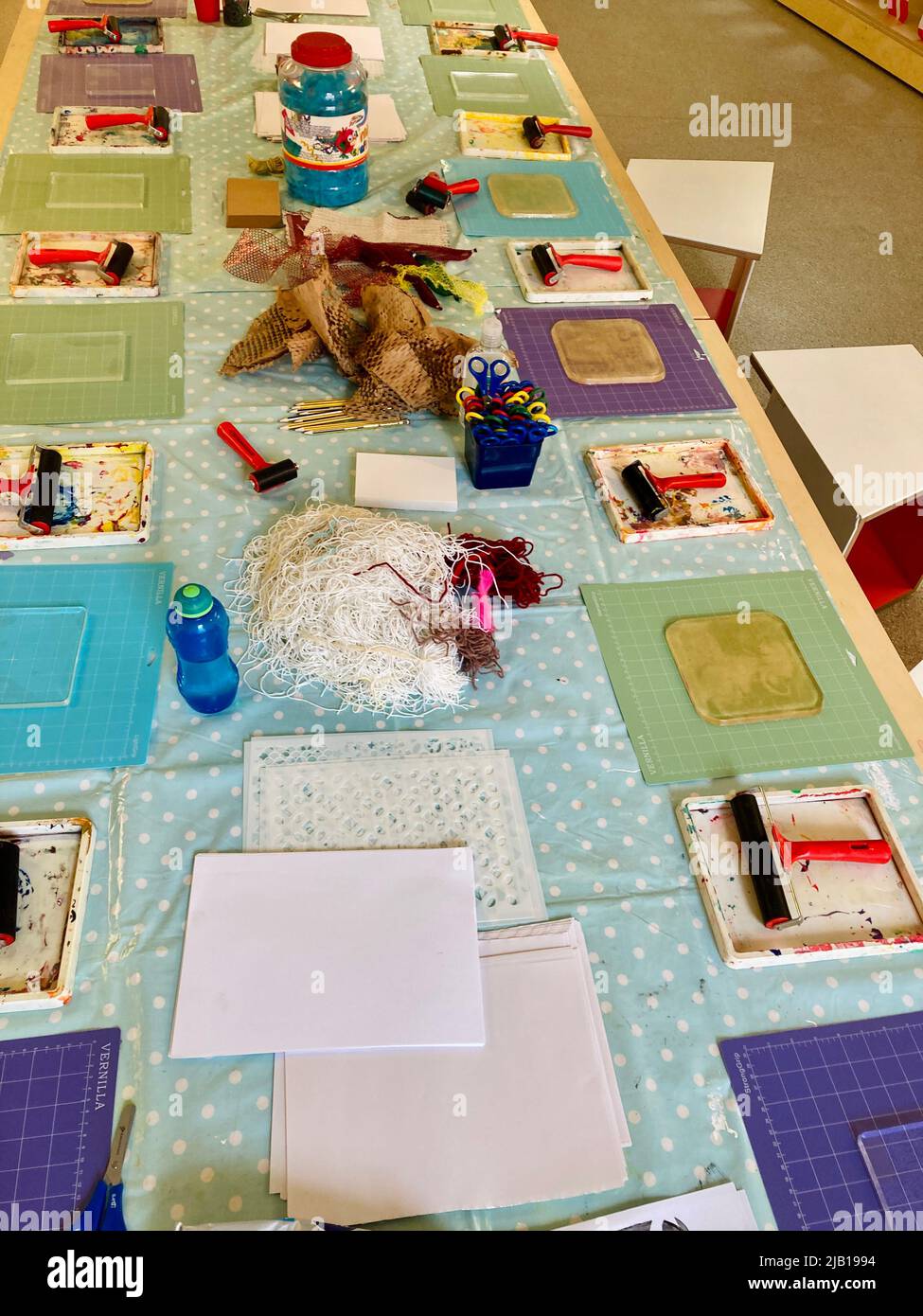 A children's art workshop set up for printing as part of a series of ...
