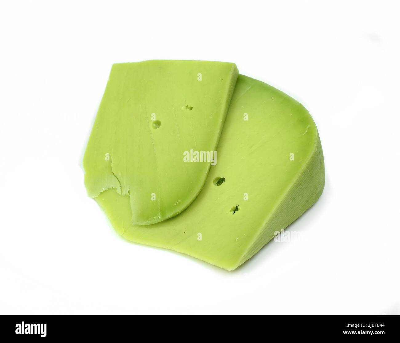 Block of hard cheese with wasabi flavor isolated on white background ...