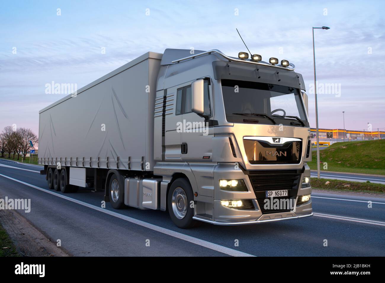 MAN TGX with a semi -trailer on the road Stock Photo - Alamy