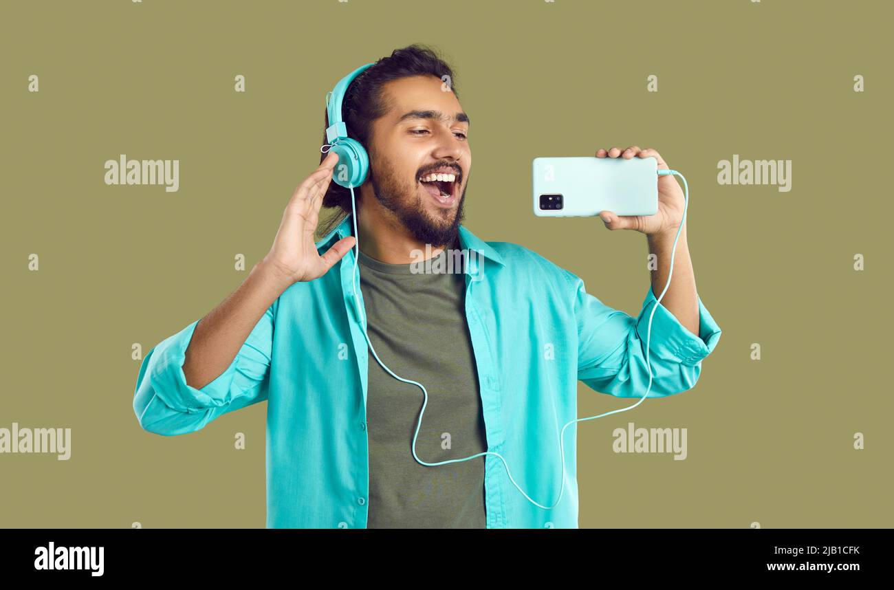 Singing into phone hi-res stock photography and images - Alamy