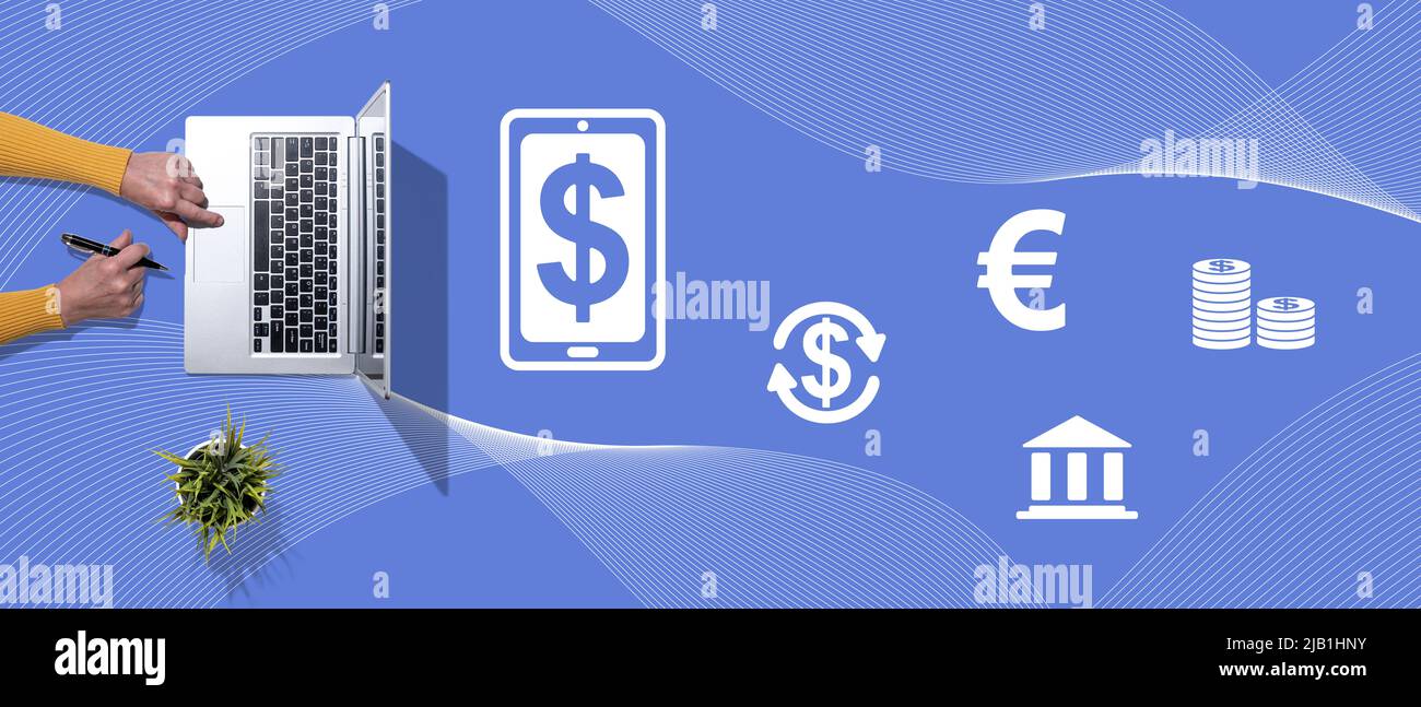 Top view of hands using laptop with symbol of mobile banking concept ...