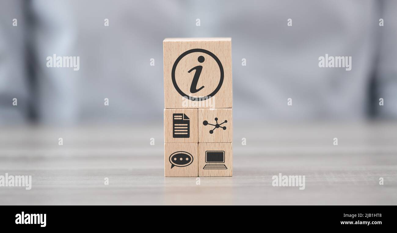 Wooden blocks with symbol of information concept Stock Photo - Alamy